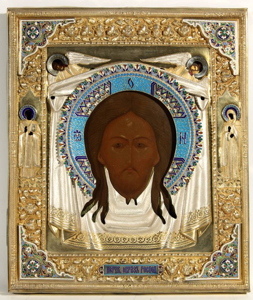 A RUSSIAN ICON OF JESUS CHRIST IN A GILT-SILVER AND CLOISONNE ENAMEL ...